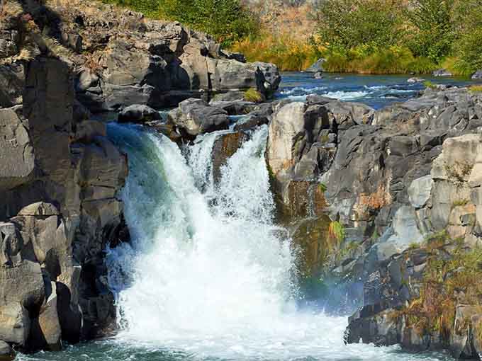 Two tiers of pure Oregon magic tumbling over ancient basalt like nature's own grand staircase.