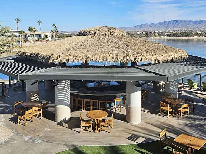 Lake Havasu stretches out behind the tiki hut, proving paradise doesn't require a plane ticket after all.