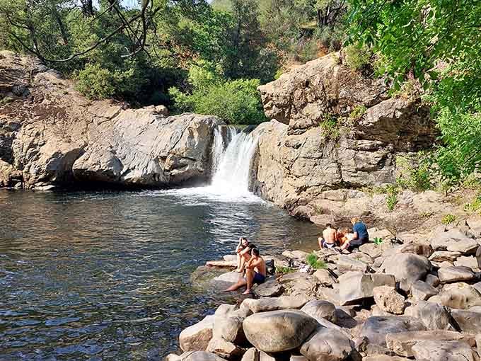 Sun-warmed rocks and cool mountain water create the perfect spot for contemplating life's simple pleasures and forgetting deadlines.