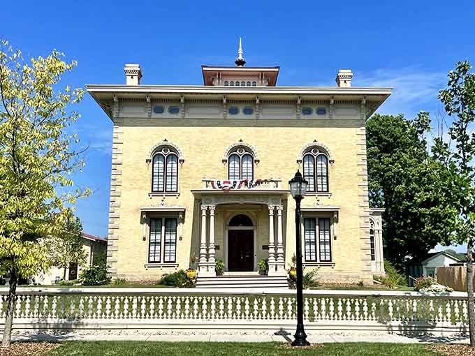 This Italianate beauty stands proud with its cream facade and ornate cupola, looking fancier than your neighbor's McMansion ever will.