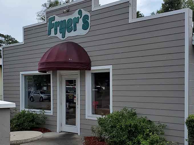 That burgundy awning is your beacon to fried chicken paradise in tiny Melrose, Florida.