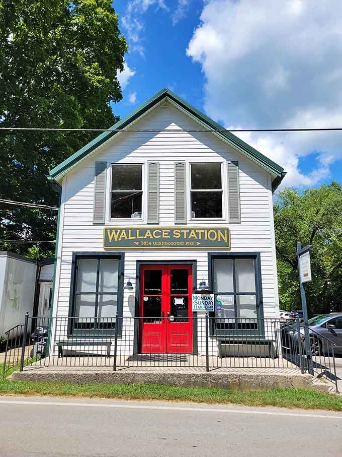 That charming white building with the red doors isn't just photogenic, it's your next lunch destination.
