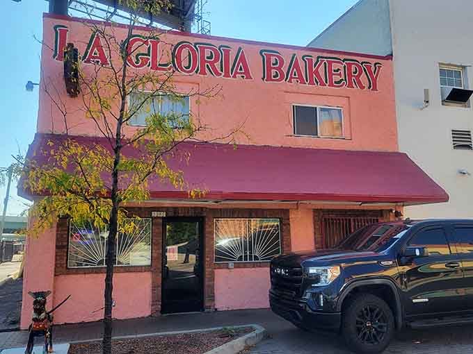 That pink building isn't shy, and neither are the tamales waiting inside for you.