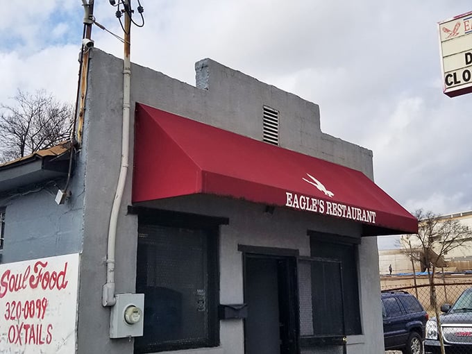 That red awning isn't just decoration, it's a beacon calling hungry souls to salvation one plate at a time.