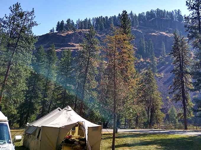 Canvas tent camping with mountain views beats any five-star hotel room, and your neighbors are infinitely quieter too.