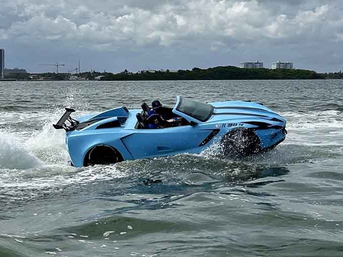 That moment when your brain short-circuits trying to process a Corvette casually cruising through actual ocean waves.