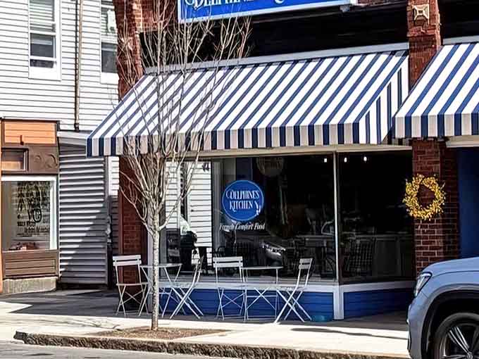 Those blue and white striped awnings whisper "Provence" louder than any guidebook ever could.