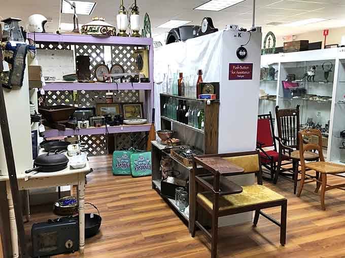Purple shelves packed with treasures prove that organization can be both functional and fabulous in vintage hunting.