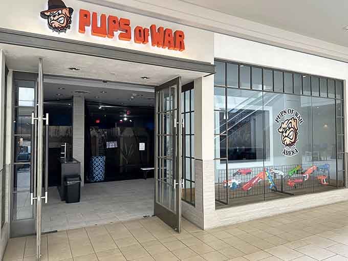 The storefront beckons with promises of foam-fueled mayhem, where shopping mall meets battlefield in the best possible way.
