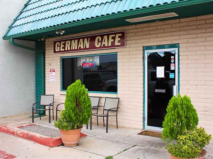 That adobe-style exterior hides some serious German culinary magic just waiting to transport your taste buds to Bavaria.