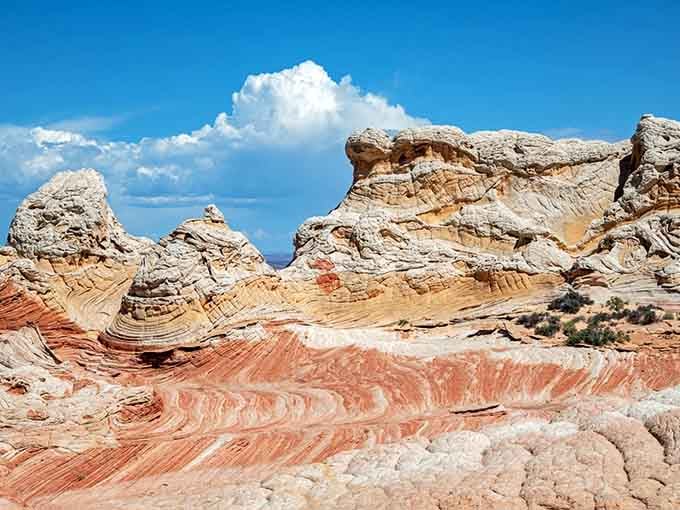 Candy-striped formations under puffy clouds prove that nature doesn't need Photoshop to create completely unbelievable scenery.