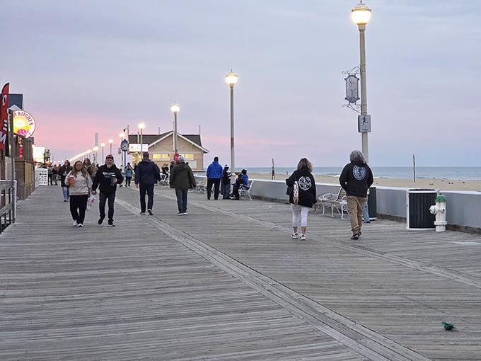 The boardwalk stretches toward infinity, where wooden planks meet cotton candy skies and possibilities feel endless.