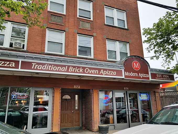That brick facade has witnessed nearly a century of pizza perfection, and it's still going strong today.