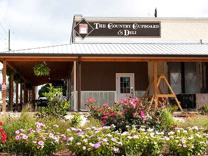 That charming storefront with the flower garden isn't trying too hard, and that's exactly why it works perfectly.