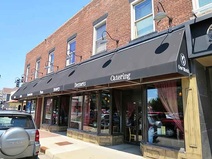 Those awnings promise coffee, salads, desserts, and catering because One World does it all with style.