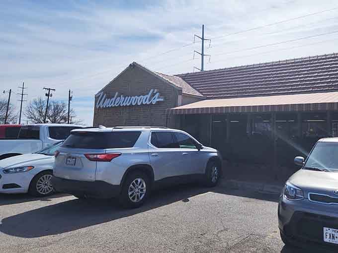 That classic script sign isn't just marking a building, it's pointing you toward your next great meal.