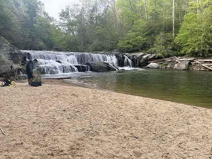 That sandy beach paired with cascading water isn't a mirage, it's your new favorite swimming spot.