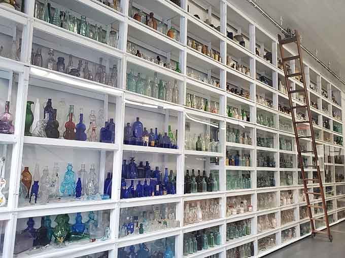 Floor-to-ceiling shelves packed with thousands of bottles create a mesmerizing glass rainbow that goes on forever.