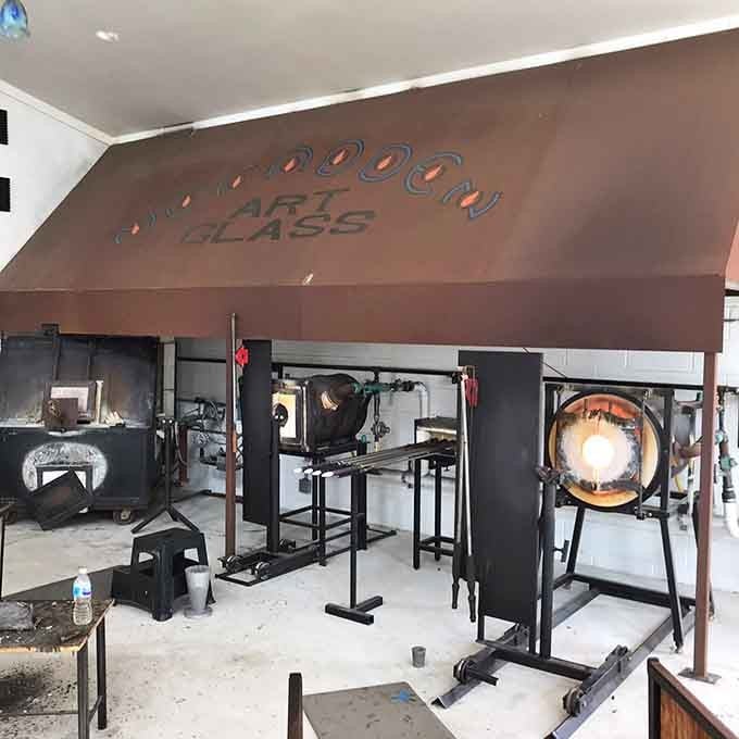 Step inside this incredible workshop where glowing furnaces and professional tools bring beautiful custom glass creations to life every day.