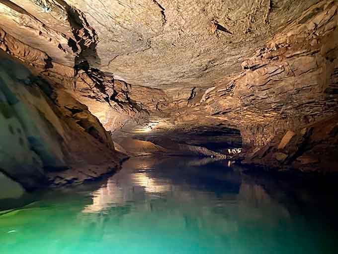 The underground river glows with an otherworldly blue-green light that makes you question reality itself.