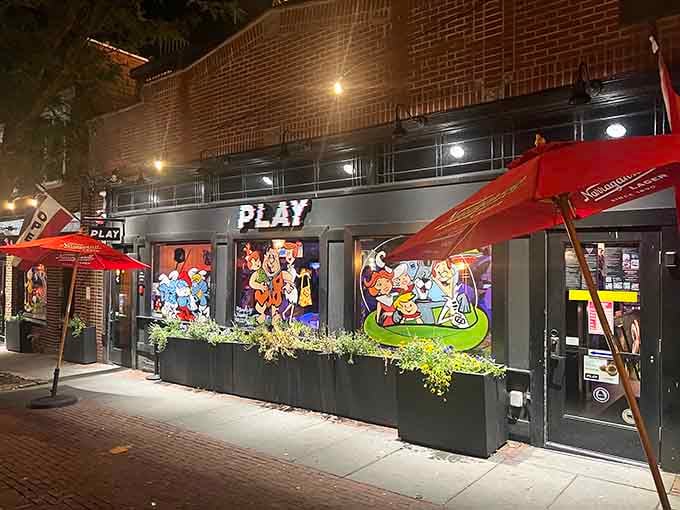 That glowing storefront isn't just inviting, it's practically begging you to come relive your youth with a cold one.
