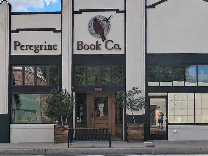 That charming storefront with the peregrine falcon logo isn't just inviting, it's practically begging you to come inside.