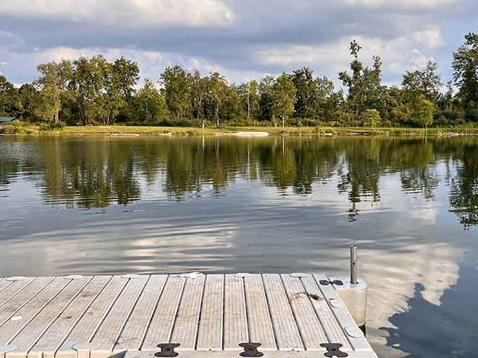 When the water's this calm, even the trees can't resist checking out their own reflections.