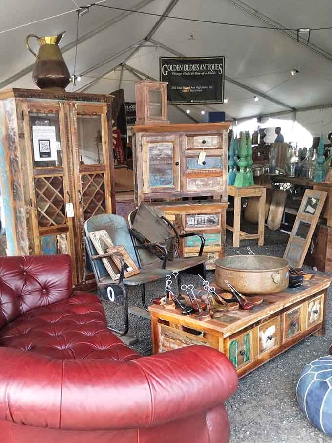 Inside the tents, furniture arranges itself like a showroom designed by time travelers with impeccable taste and endless storage space.