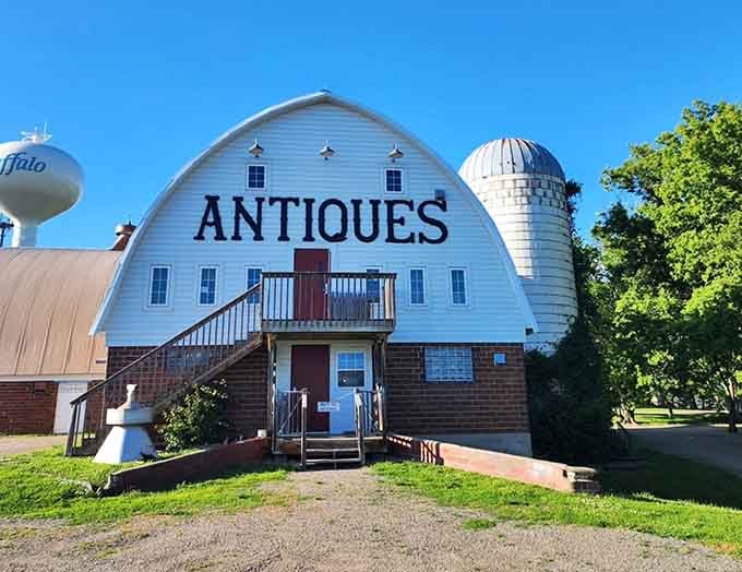 That brilliant blue barn stands like a beacon for treasure hunters, impossible to miss and even harder to resist.