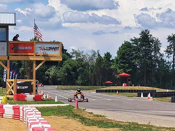 The start tower watches over everything like a proud parent, minus the embarrassing stories at Thanksgiving dinner about your driving skills.