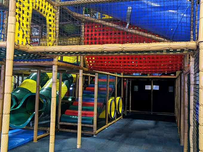 That towering play structure isn't just for kids, it's basically an architectural marvel designed for maximum fun.