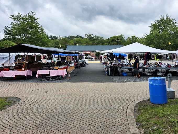 Multiple vendor tents line the walkways, creating an inviting marketplace atmosphere perfect for a leisurely weekend treasure hunt adventure.