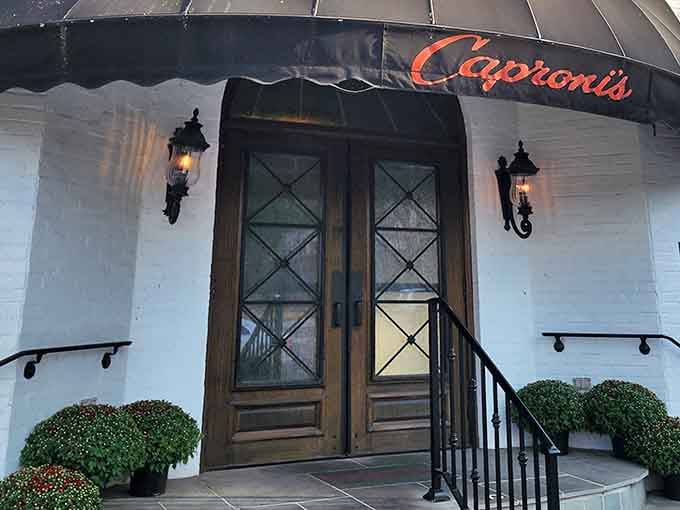 Those elegant double doors flanked by glowing lanterns aren't just an entrance, they're a promise of good things ahead.