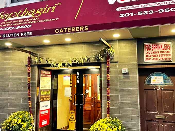That burgundy awning beckons like a flavor-filled lighthouse guiding hungry souls to vegetarian paradise in Jersey City.