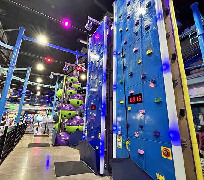 Speed climbing walls with timers because apparently we all need proof of our athletic decline.
