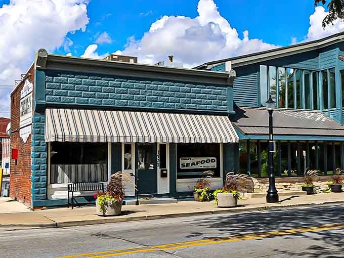 That striped awning beckons like a lighthouse for landlocked seafood lovers seeking salvation in downtown Fort Wayne.