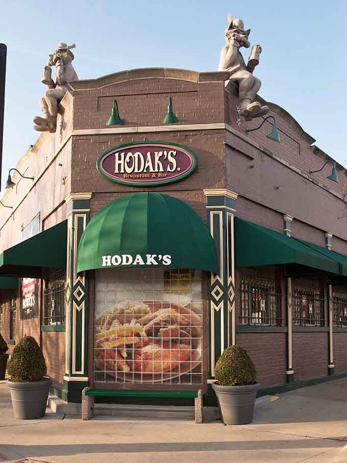 Those whimsical rooftop figures have been watching over hungry diners for generations, like delicious gargoyles of comfort food.