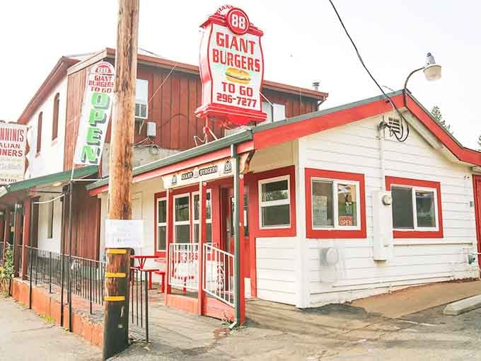 That cheerful red and white exterior isn't just cute&mdash;it's a beacon calling hungry travelers to burger salvation.