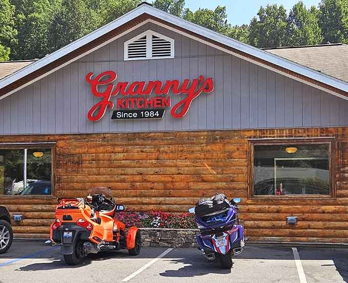 That red script sign against wood paneling isn't just decoration—it's a beacon calling hungry travelers home.