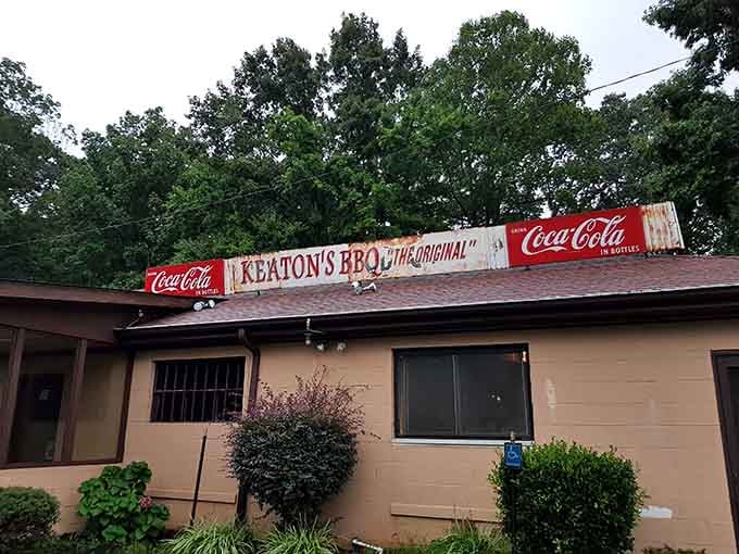 That weathered Coca-Cola sign isn't vintage decor; it's a badge of honor earned through decades of service.