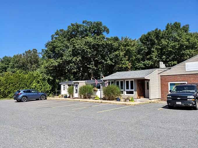 That unassuming cottage-style building is your gateway to breakfast bliss, hiding in plain sight along Route 70.