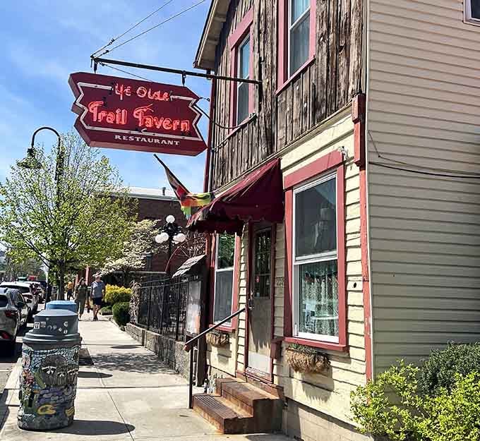 That weathered wood and glowing neon sign aren't trying to look old, they've earned every gorgeous year of patina.