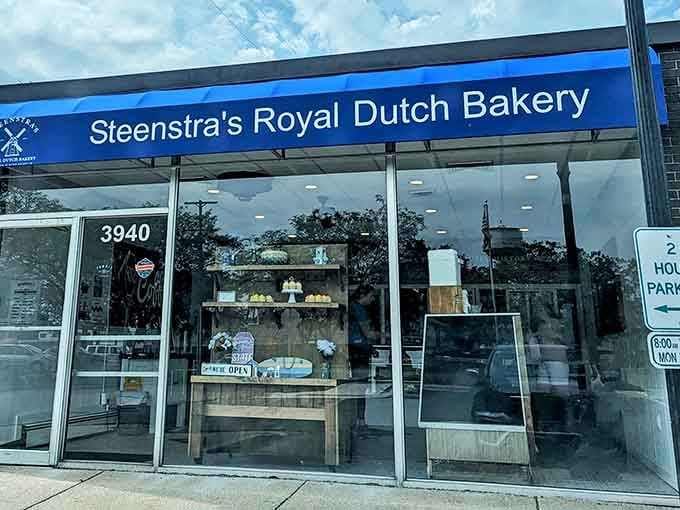 That blue awning beckons like a lighthouse guiding ships to shore, except here the treasure is pastries.