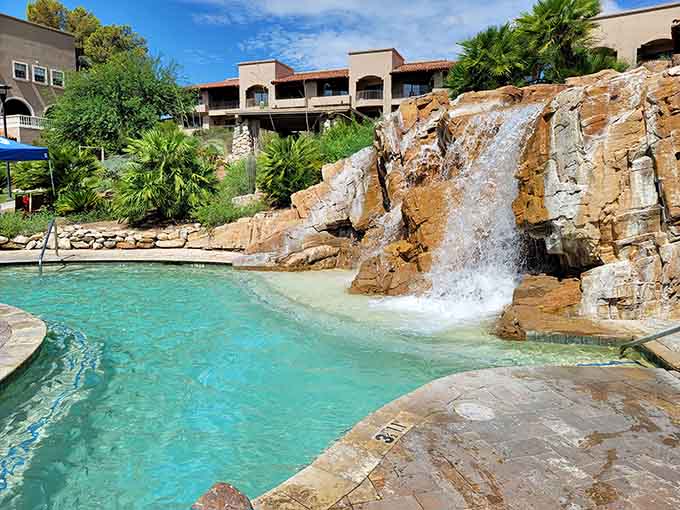 That mineral waterfall isn't just for show&mdash;it's basically a spa treatment disguised as poolside fun.
