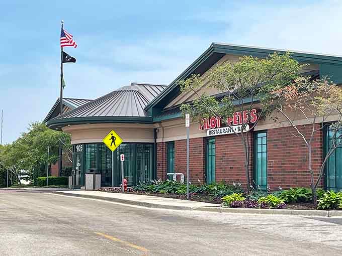 The unassuming exterior hides an aviation wonderland inside, proving that the best adventures often start in suburban strip malls.