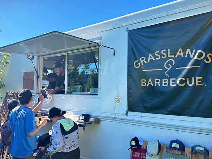 That white food truck on the lawn isn't just serving lunch, it's serving a masterclass in Texas barbecue.
