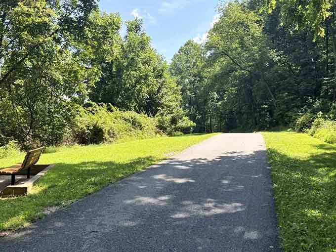 Wide, smooth, and welcoming, this paved path practically begs you to take a stroll around the lake.