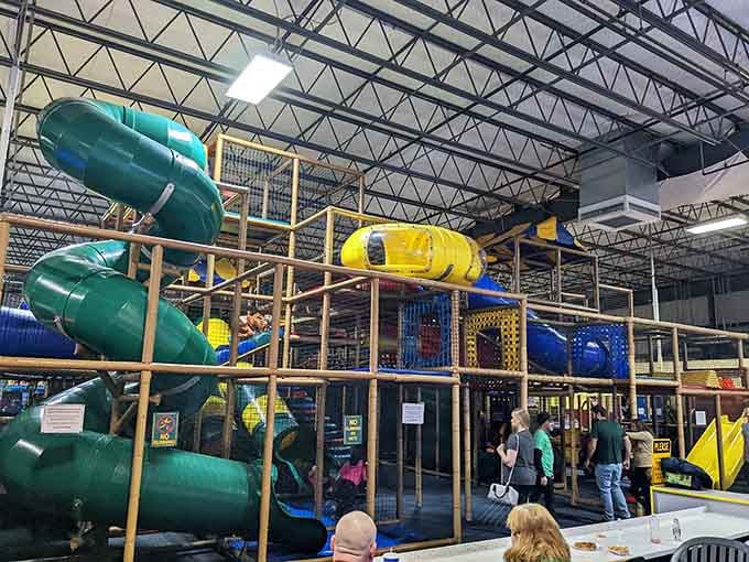That towering play structure isn't just for kids, it's basically an architectural marvel designed for maximum fun.