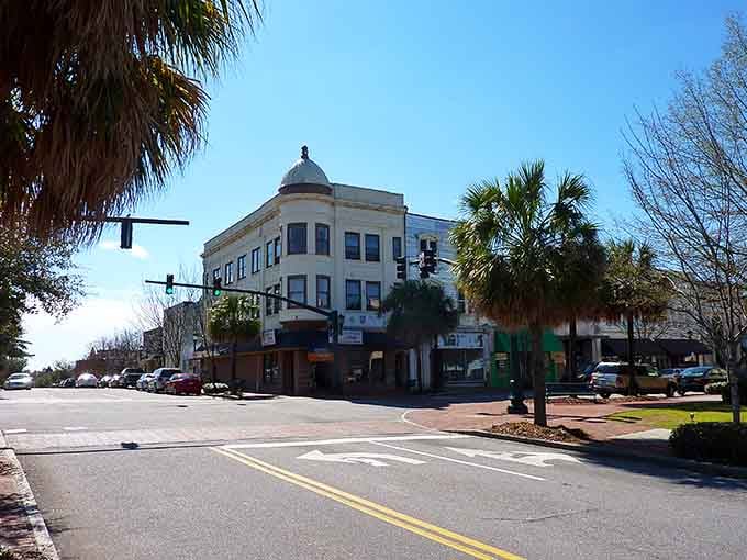Historic buildings line streets where Southern charm isn't just a saying, it's the actual municipal building code.