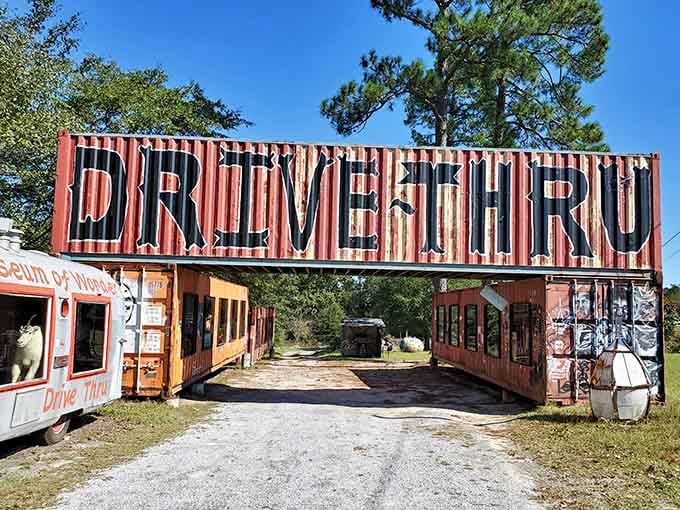 That bold corrugated metal gateway announces you've arrived somewhere wonderfully weird, where art meets Alabama in the most unexpected way.